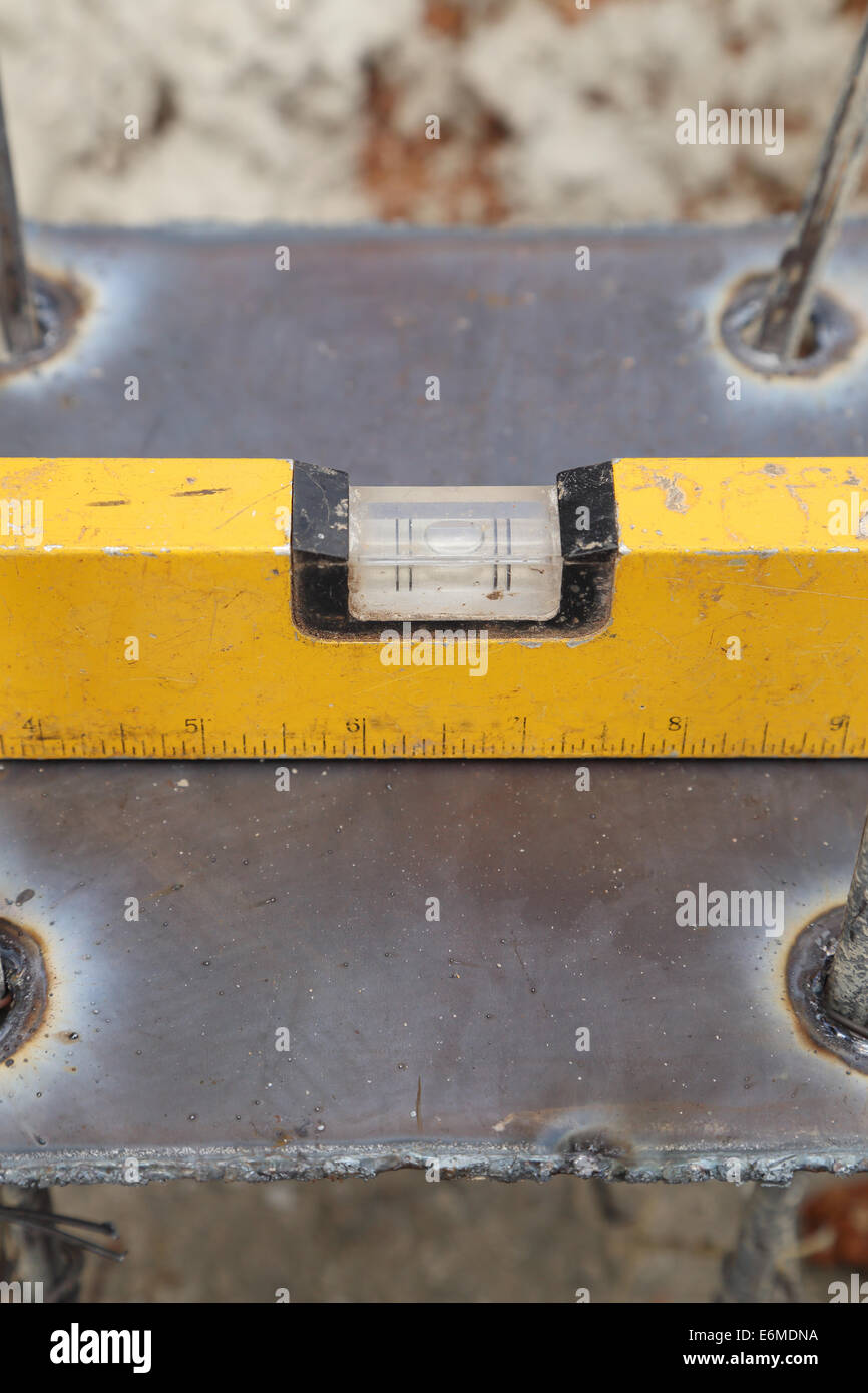construction level meter checking at construction site Stock Photo - Alamy