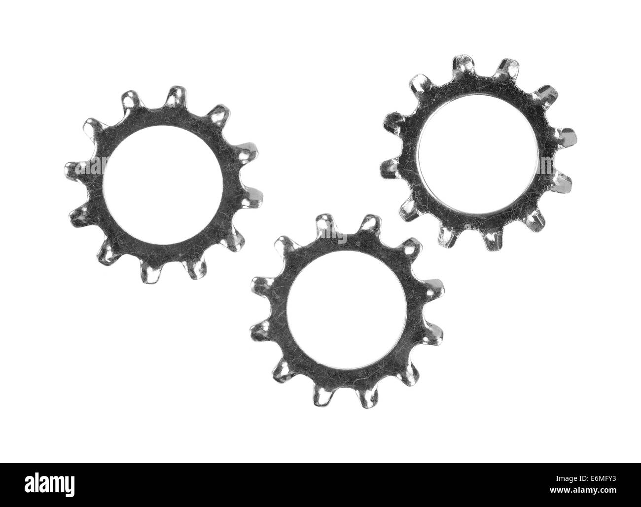 A group of three internal toothed lock washers on a white background ...