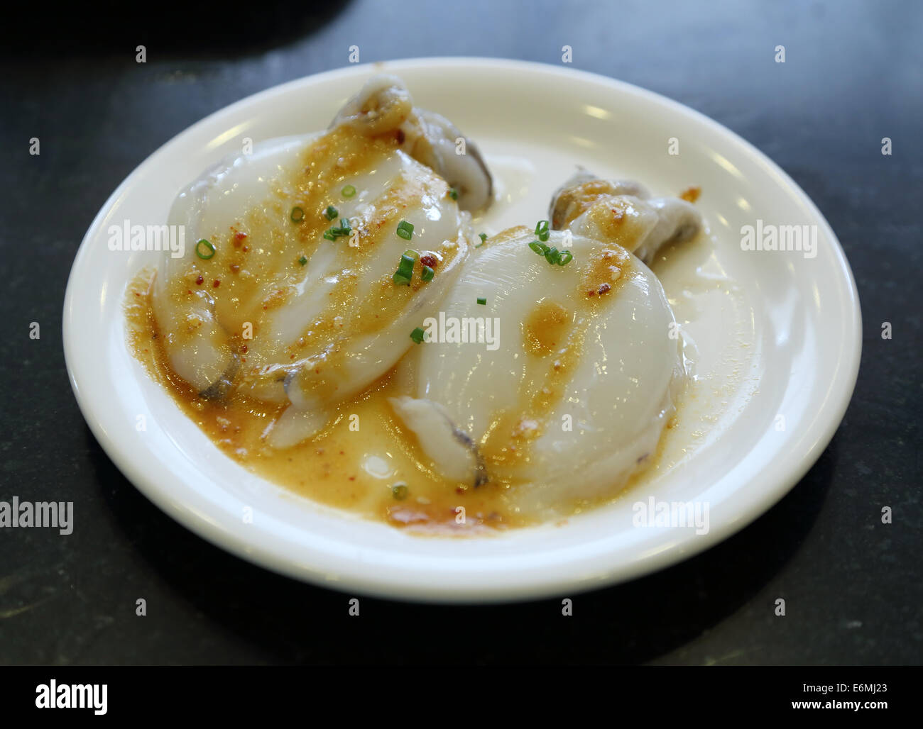 Fresh squid with spicy sauce prepare for grilled Stock Photo - Alamy