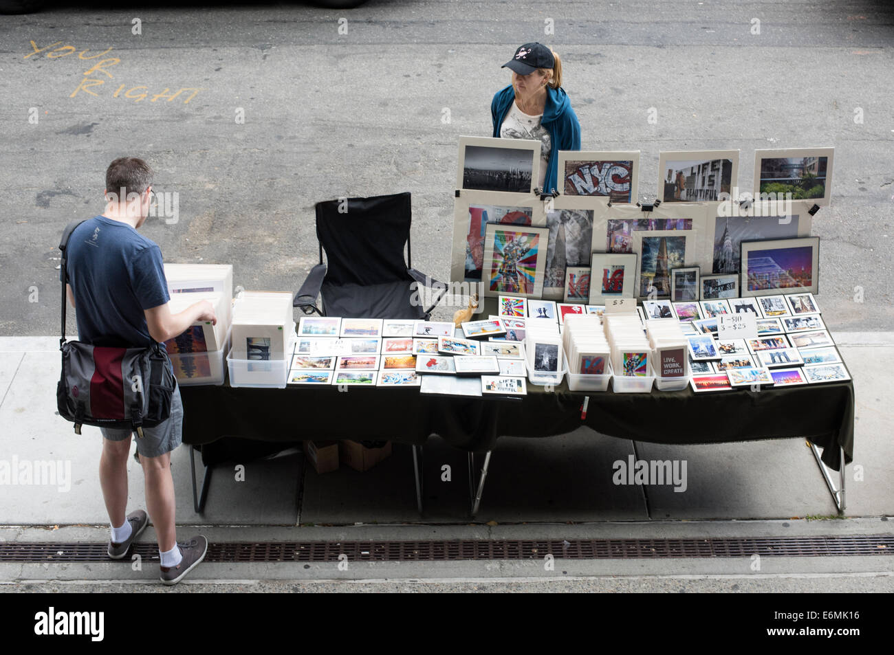 Street vendor selling photos and artwork in New York City Stock Photo ...