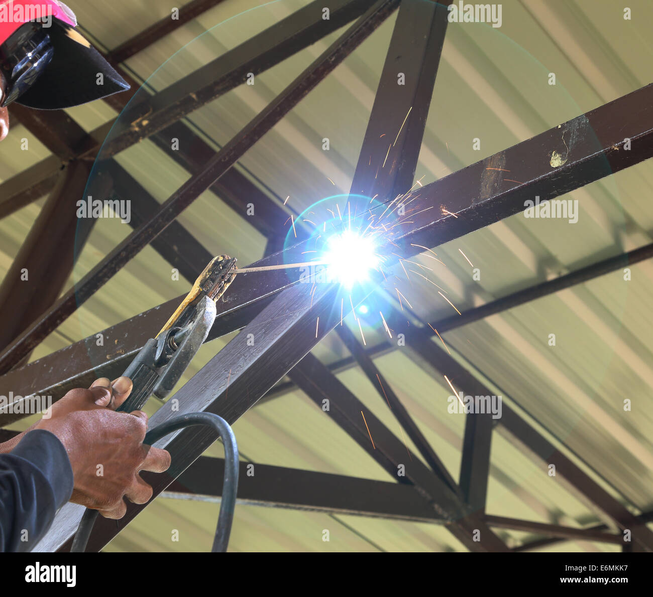 worker use electric welding connecting construction metal Stock Photo ...