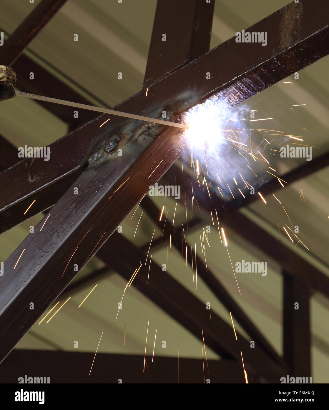 worker use electric welding connecting construction metal Stock Photo ...