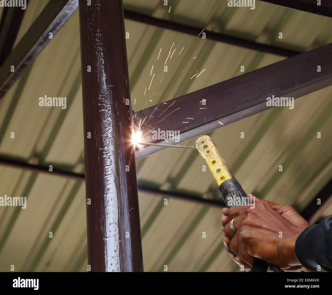 worker use electric welding connecting construction metal Stock Photo ...