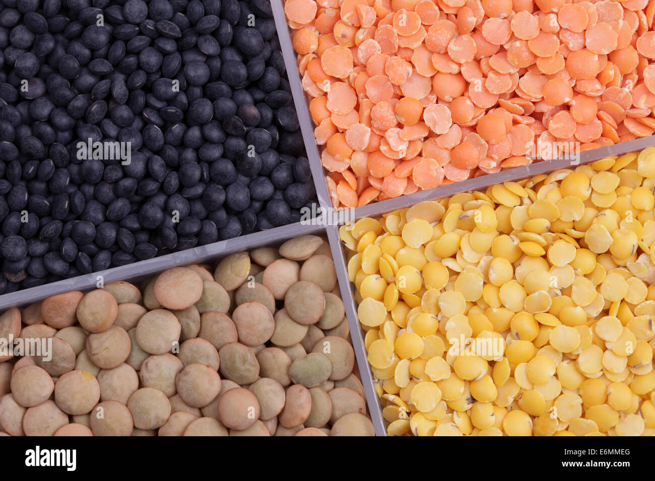 Lentils in a containers. Closeup Stock Photo - Alamy