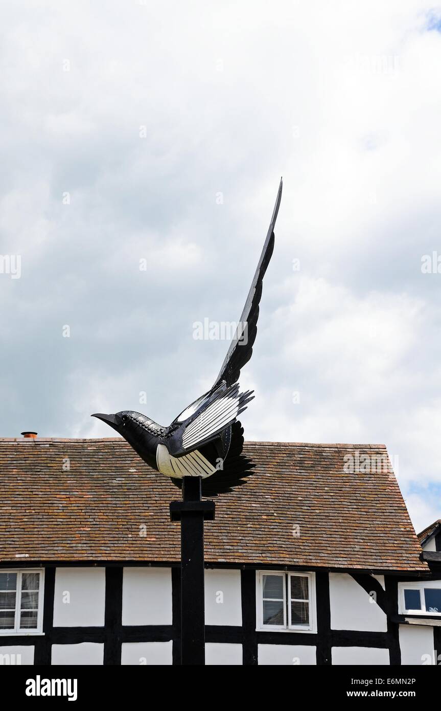 The magpie sculpture with white timbered buildings to the rear, Weobley ...