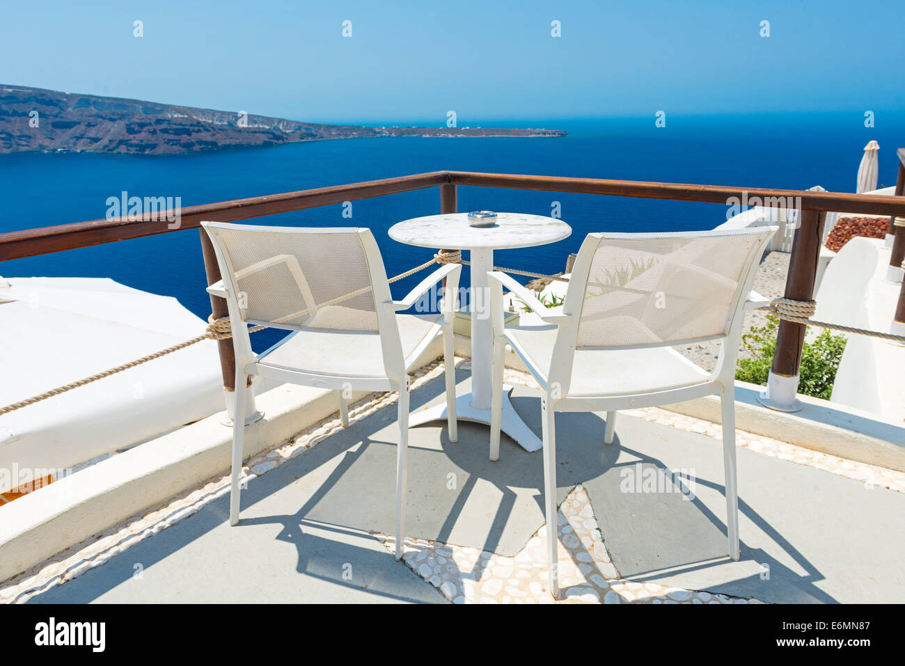 Chairs With Beautiful View To Relax in Santorini, Greece Stock Photo ...