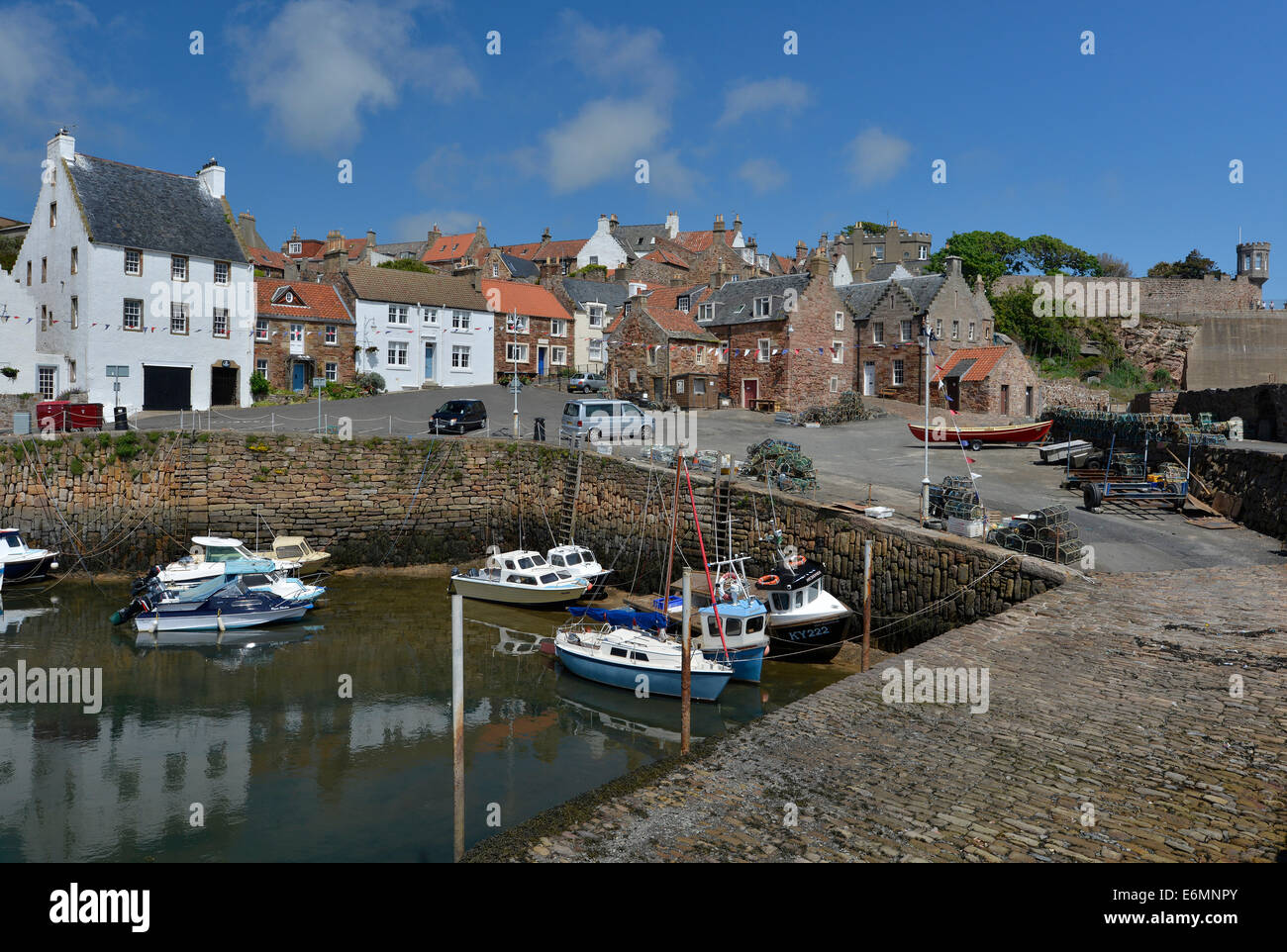 Small fishing boats in the harbour of Crail, Fife peninsula, Scotland ...