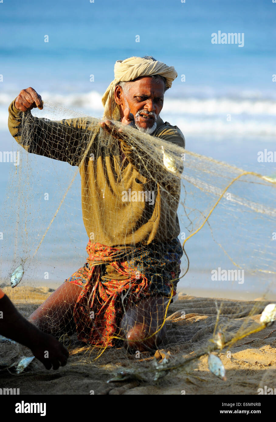 Fisherman small fish hi-res stock photography and images - Alamy