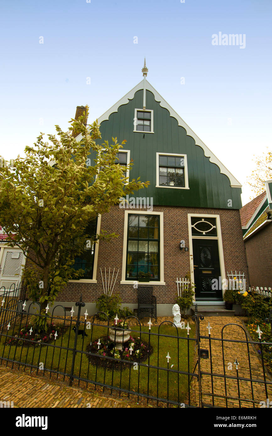 rural dutch scenery of small old houses and canal in Zaanse ...
