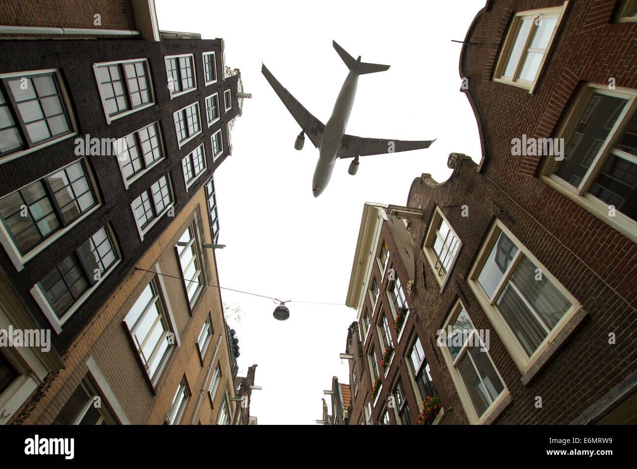 plane over Amsterdam Stock Photo - Alamy