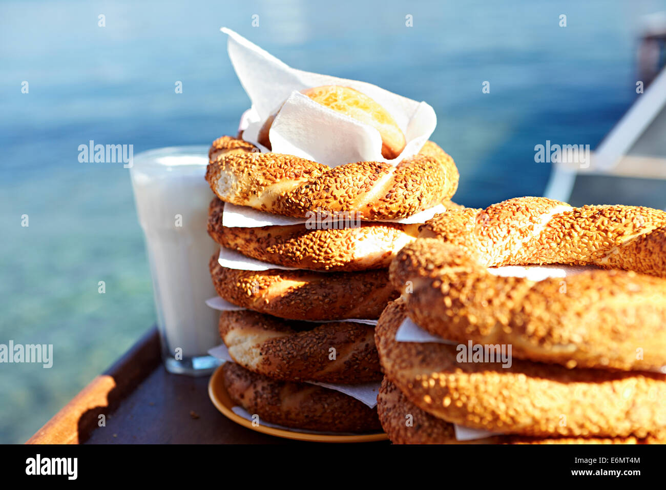 Relaxing with traditional food and drink by the clear blue sea at the ...