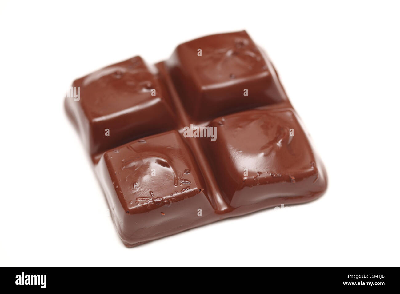 Melting chocolate. White background Stock Photo - Alamy