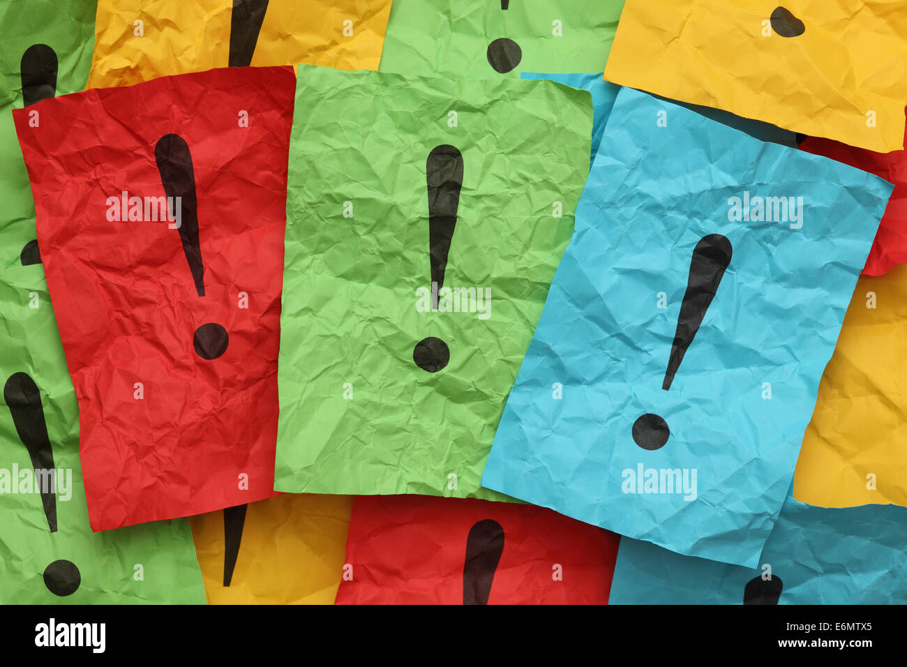 Crumpled colorful paper notes with exclamation marks Stock Photo - Alamy