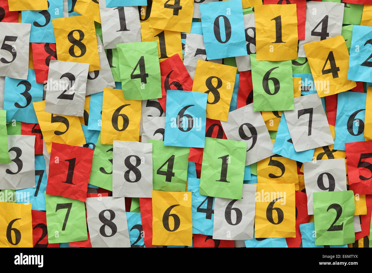 Heap of crumpled colorful paper notes with numbers Stock Photo - Alamy
