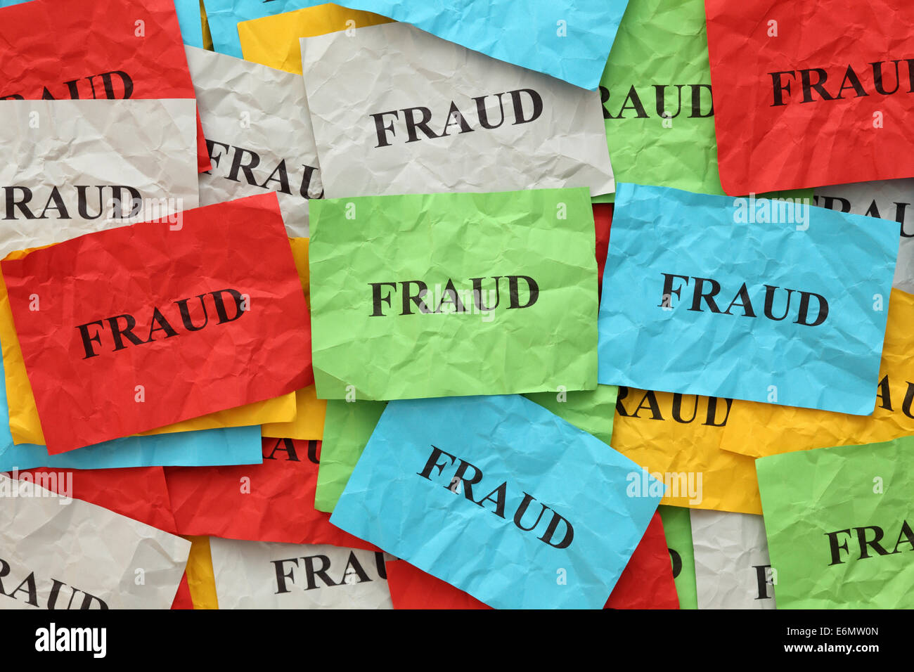Crumpled colorful paper notes with the word "Fraud Stock Photo - Alamy