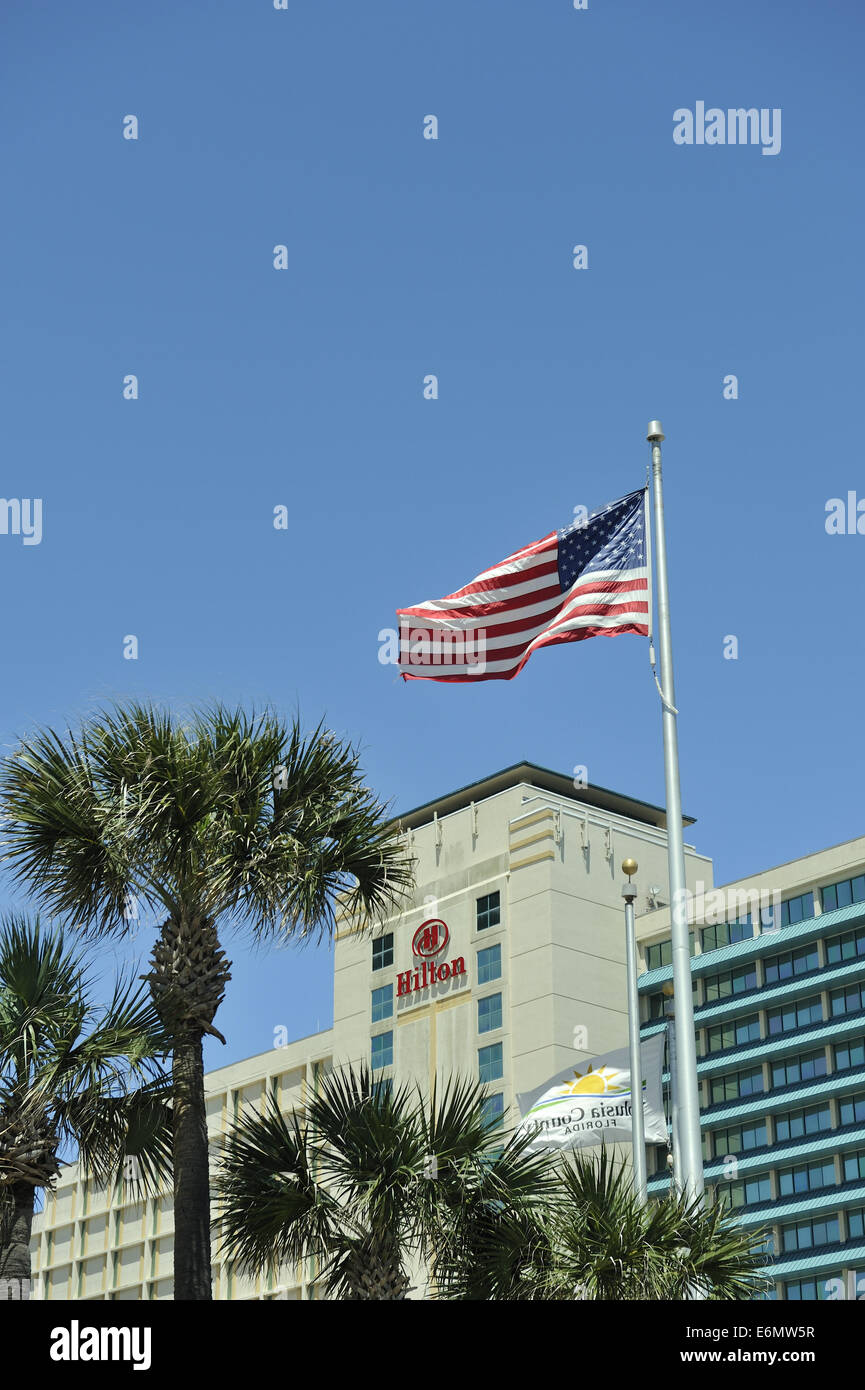 Hilton Hotel and American Flag. Daytona Beach, Florida, USA Stock Photo ...