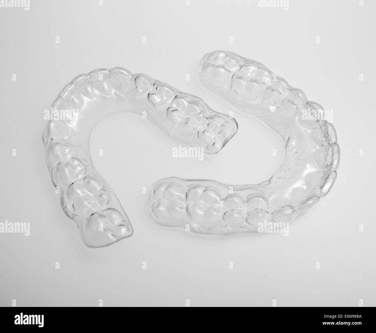 Translucent essix retainer Stock Photo - Alamy