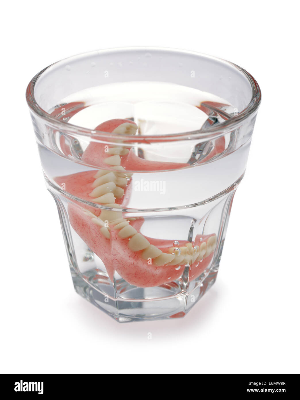 Dentures in glass water Cut Out Stock Images & Pictures - Alamy