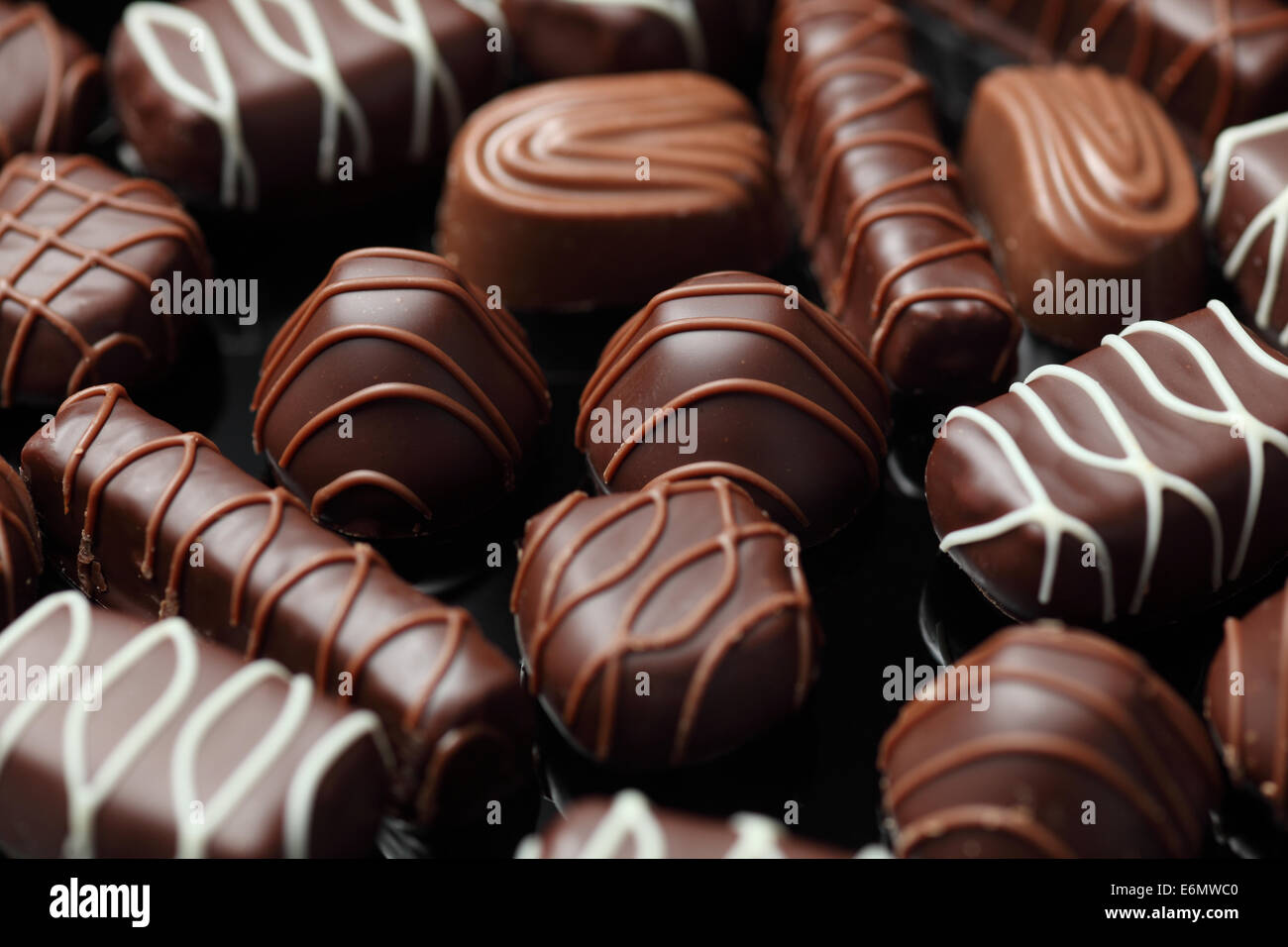 Lots of chocolate candies Stock Photo - Alamy