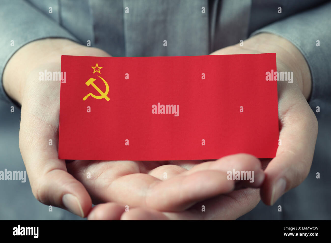 Caring hands hold the Soviet Union flag (Former USSR Flag Stock Photo ...