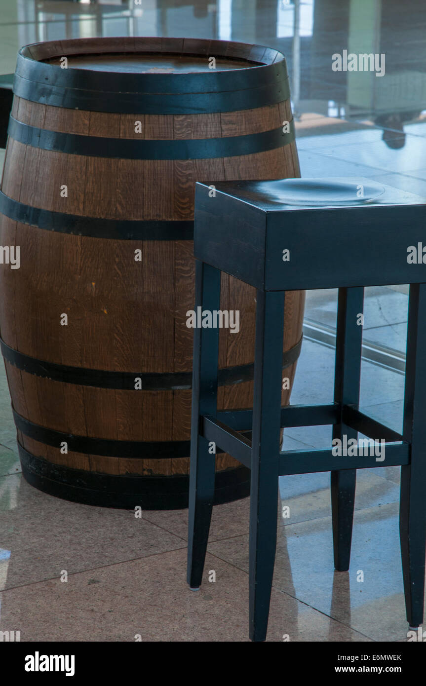very bizarre bar decorated with a drum as a table Stock Photo - Alamy