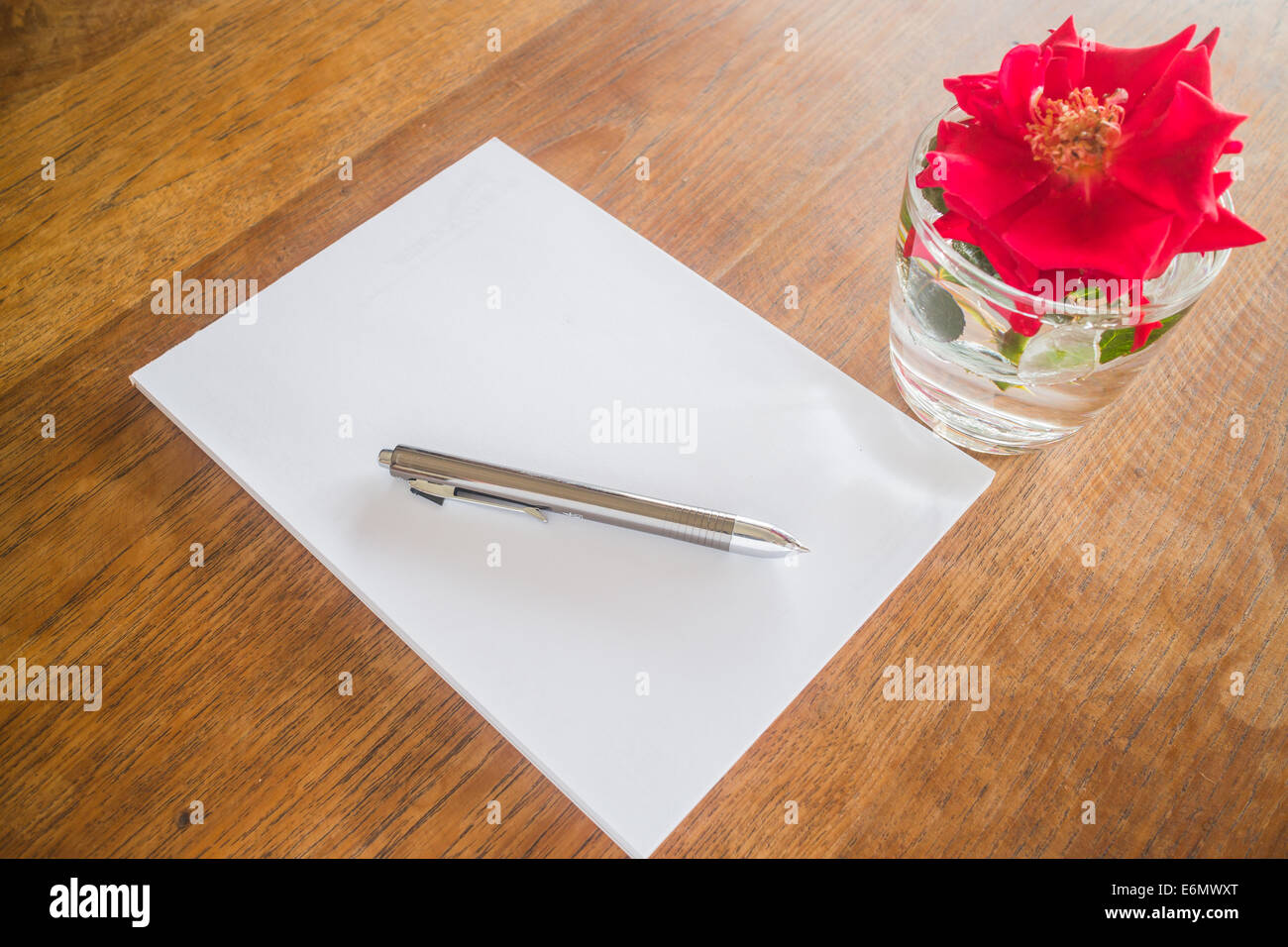 Love letter paper on wooden table, stock photo Stock Photo - Alamy