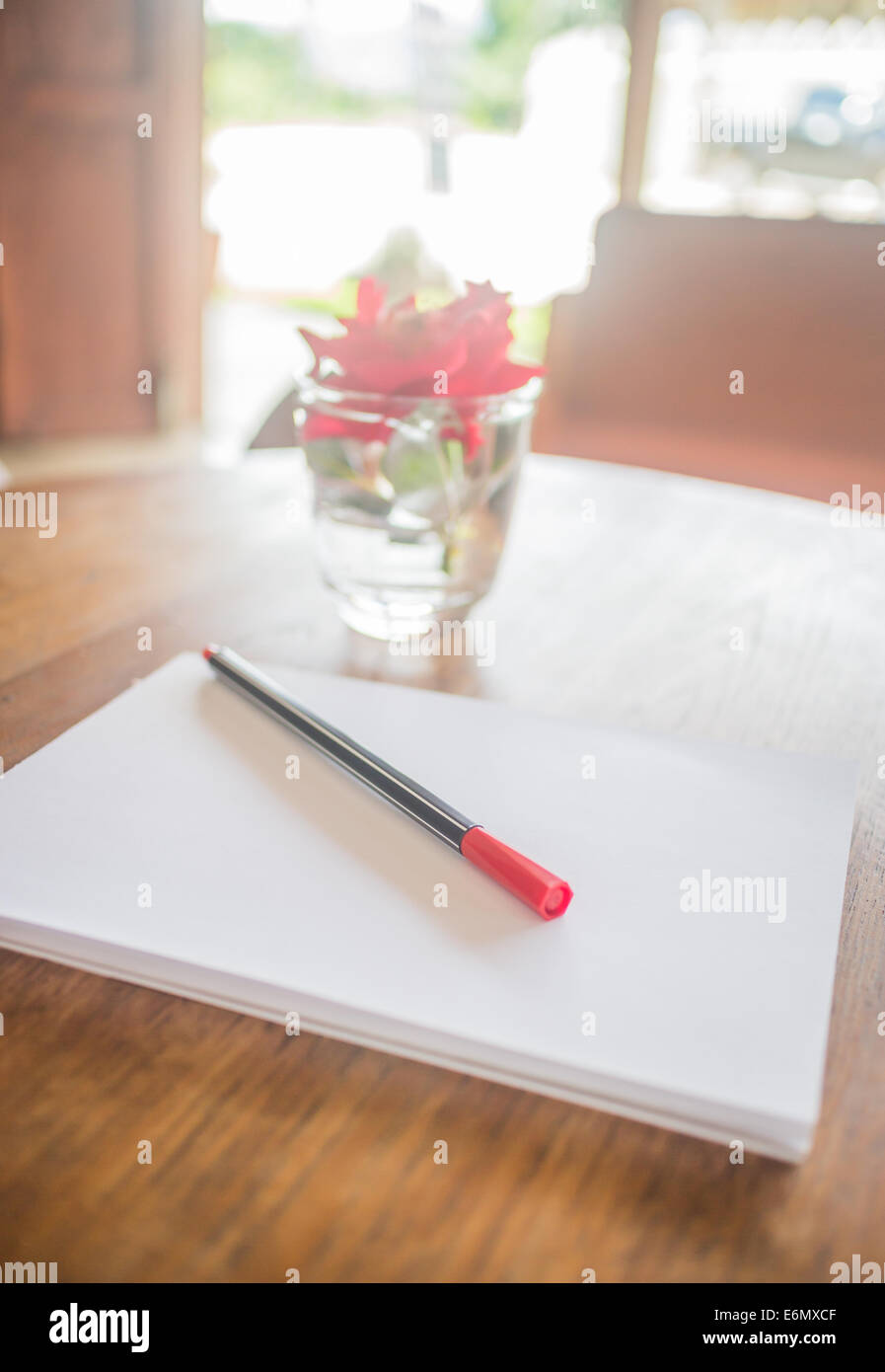 Romantic work table with rose, stock photo Stock Photo - Alamy