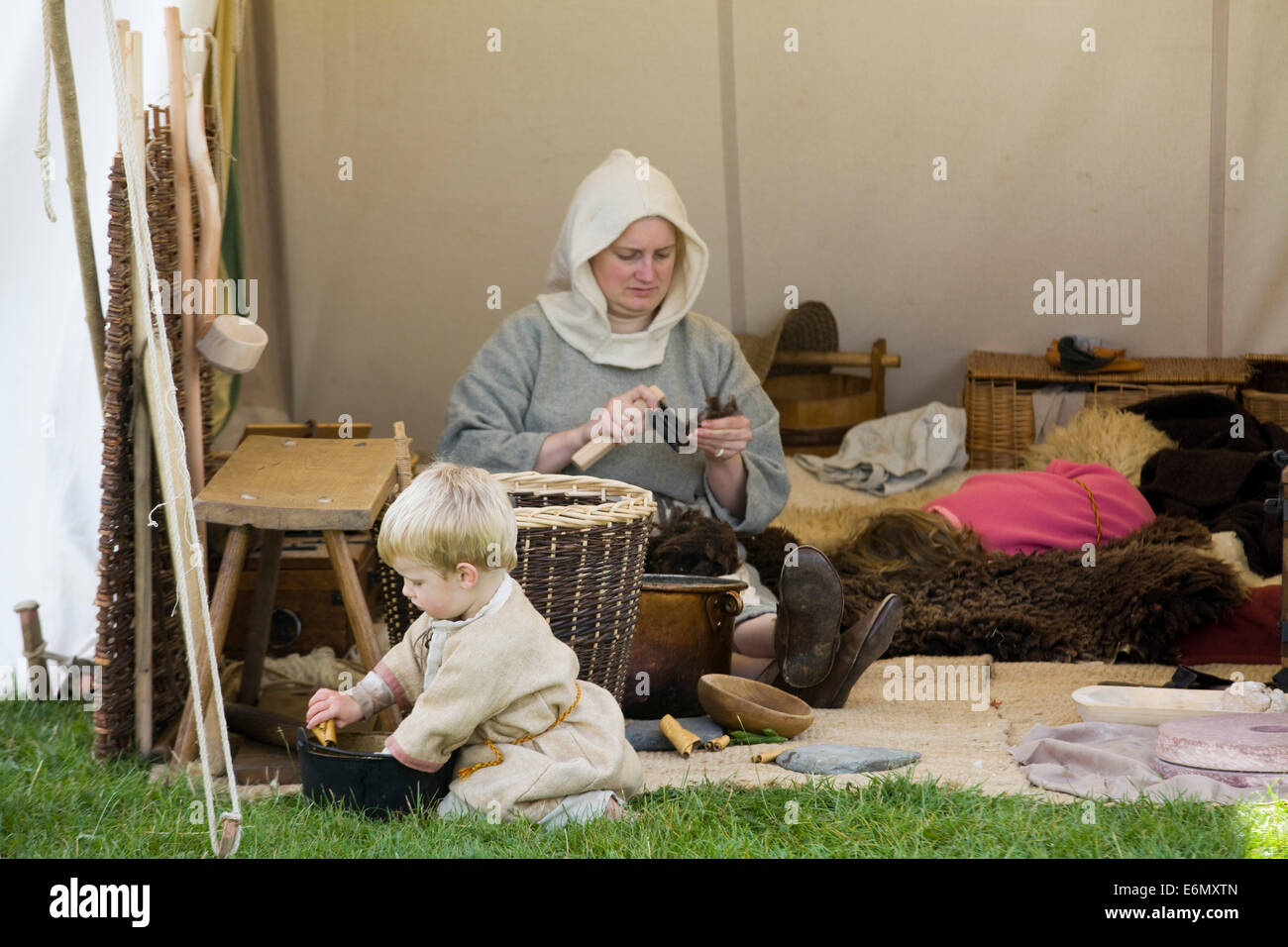 Viking mother and son n a tent at a historical reenactment Stock Photo ...