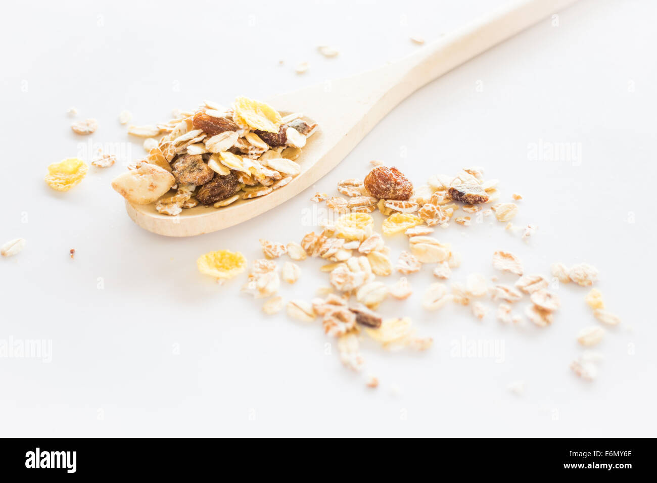 Crunchy muesli on clean white background, stock photo Stock Photo - Alamy