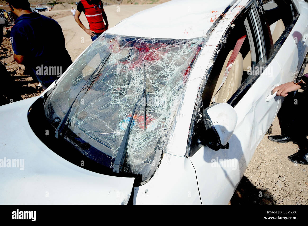 Duhok, Iraq. 27th Aug, 2014. A car that plunged into a ditch off the ...