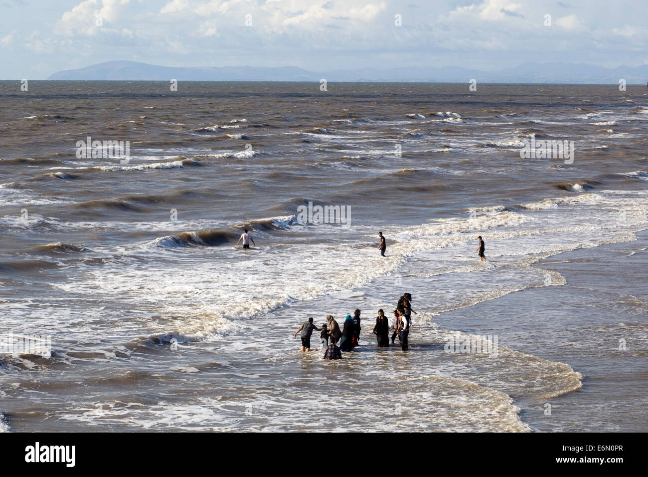people playing in the sea at a beach in Blackpool England Stock Photo ...