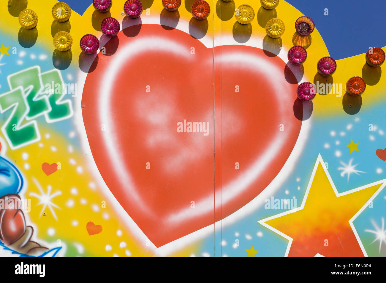 Spray painted Customized fairground ride heart in Lights Stock Photo ...