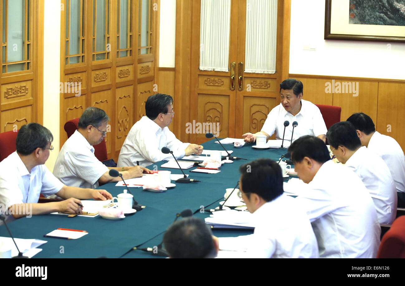Beijing, China. 27th Aug, 2014. Chinese President Xi Jinping (rear ...