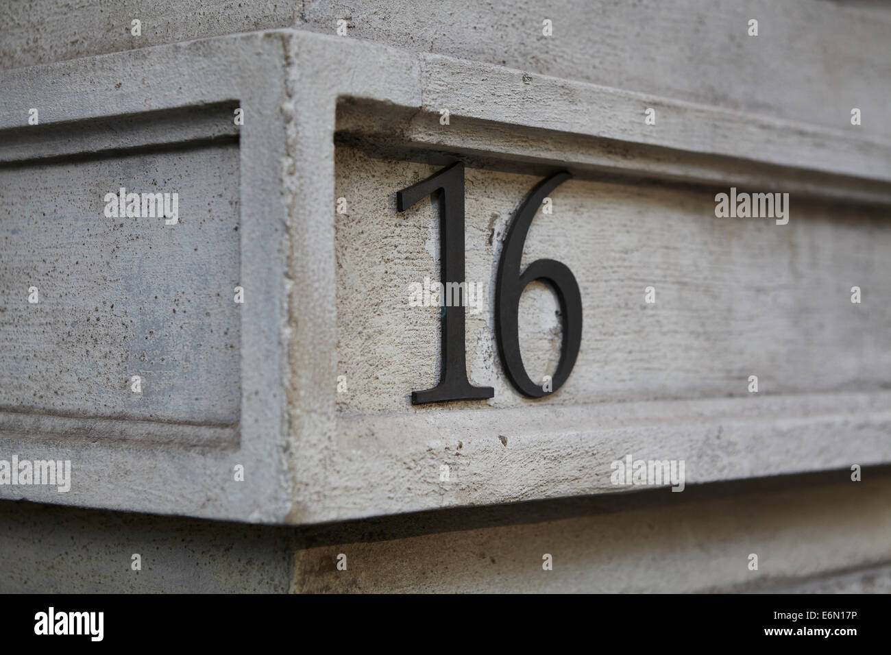 Corner of a building stone building house number 16 hi-res stock ...