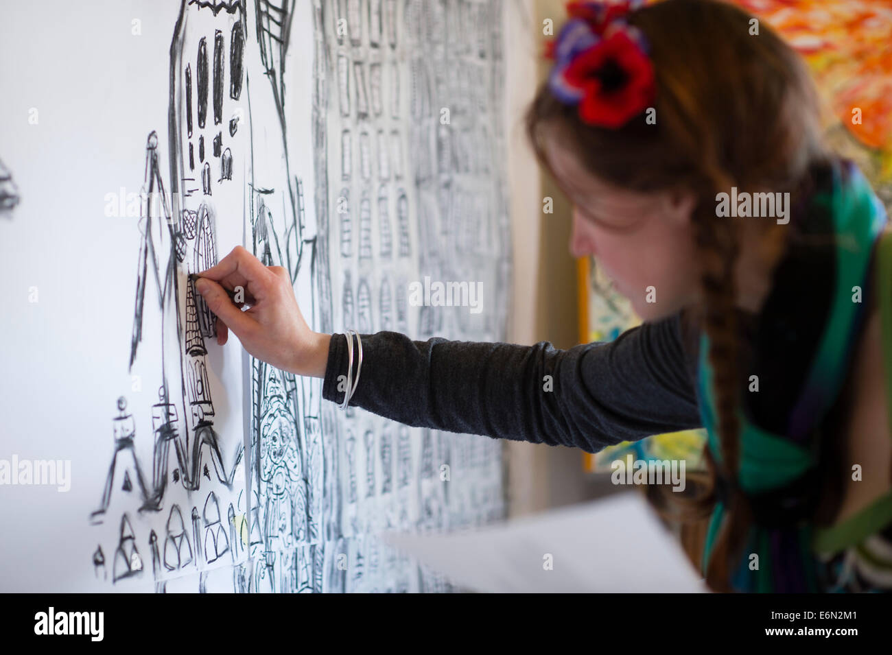 Artist LAURA LUNN working on a drawing in her studio at The Old School ...