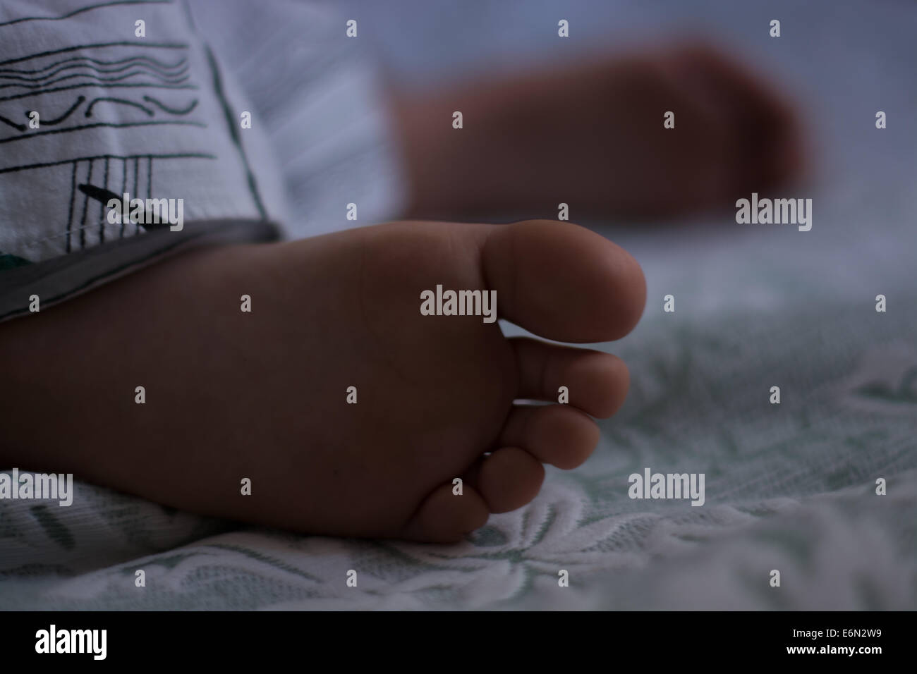 close up of a childs sleeping feet Stock Photo - Alamy