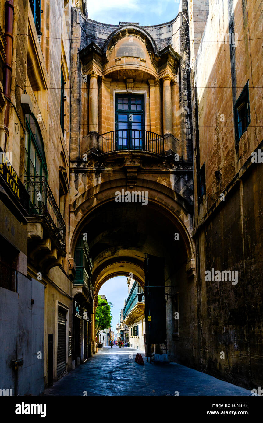 An ornately sculptured building connecting two sides of a palace ...