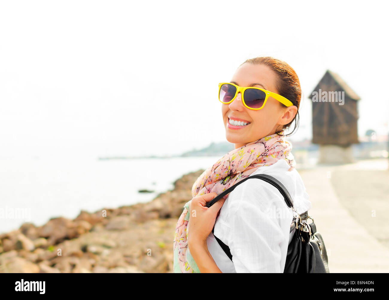 Attractive girl tourist, smiling walking outdoors Stock Photo - Alamy