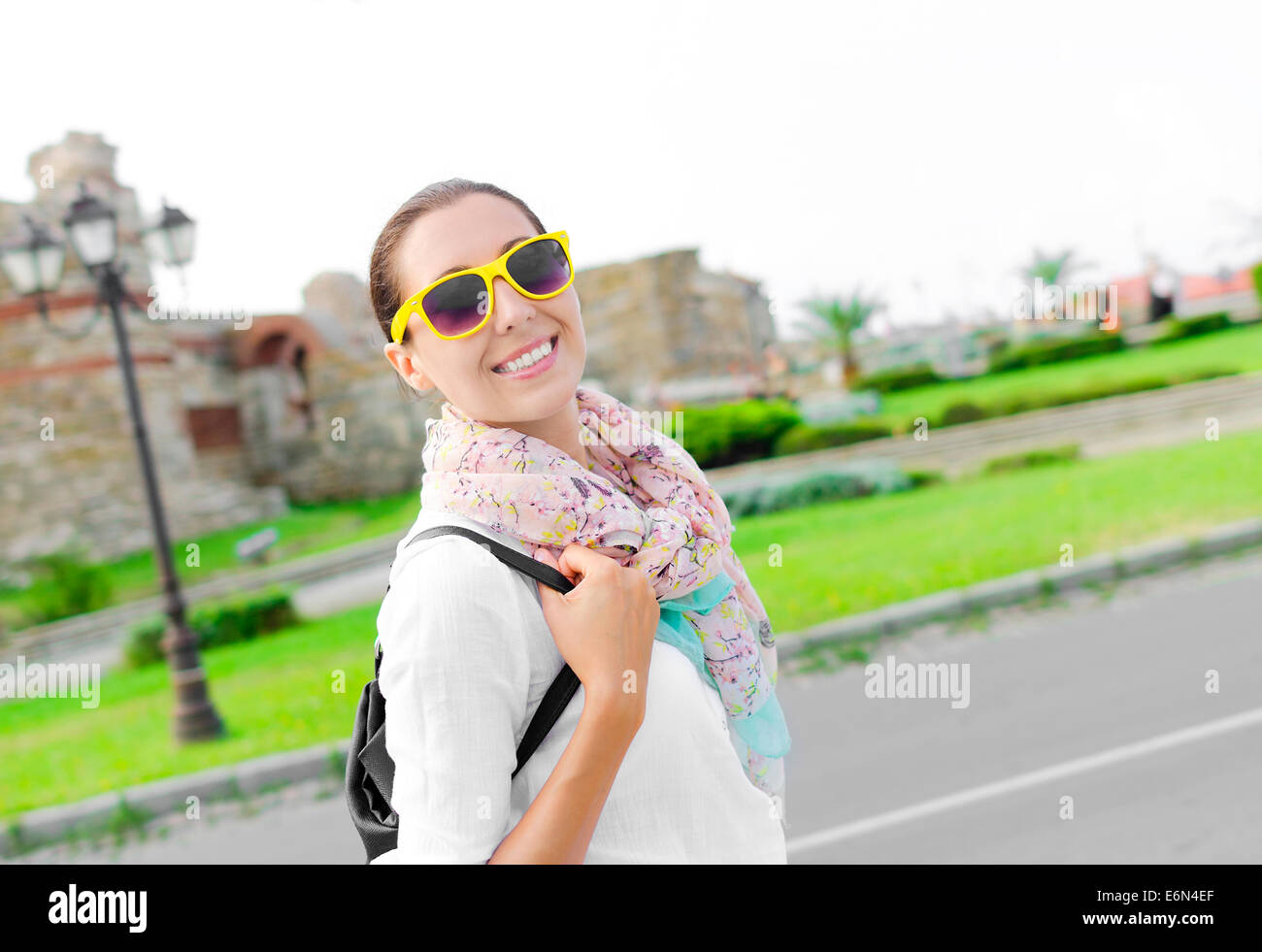 Attractive girl tourist, smiling walking outdoors Stock Photo - Alamy