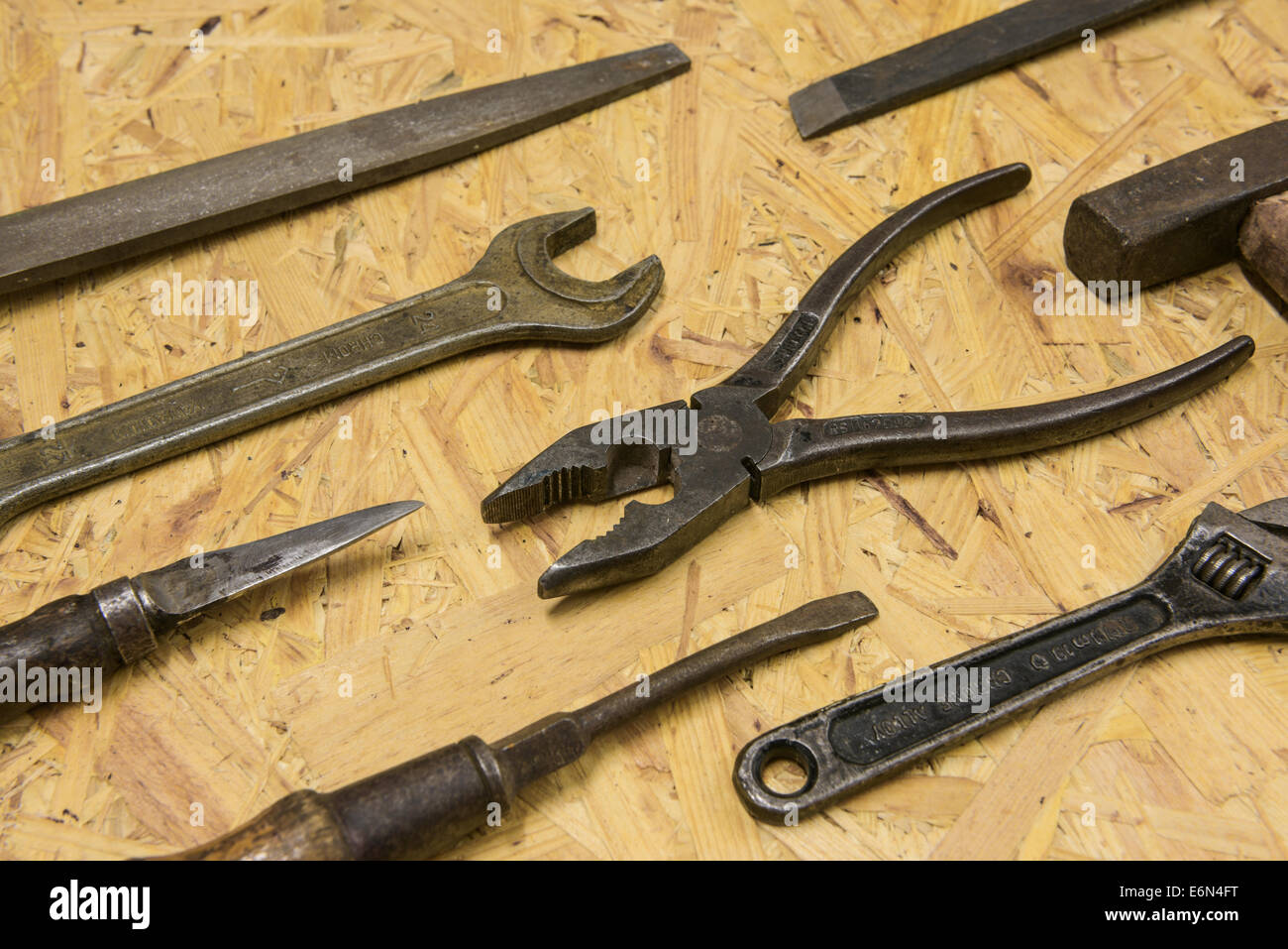 Old rusty tools on a hardboard Stock Photo - Alamy