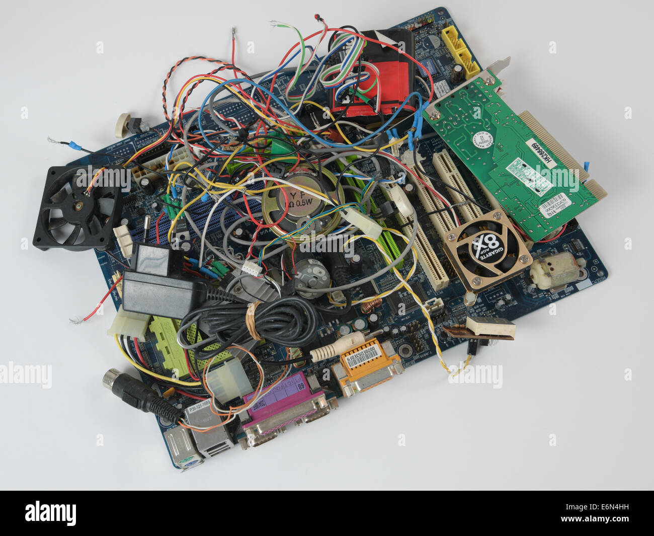 Set of electronic waste, computer motherboard, wires, battery, some ...