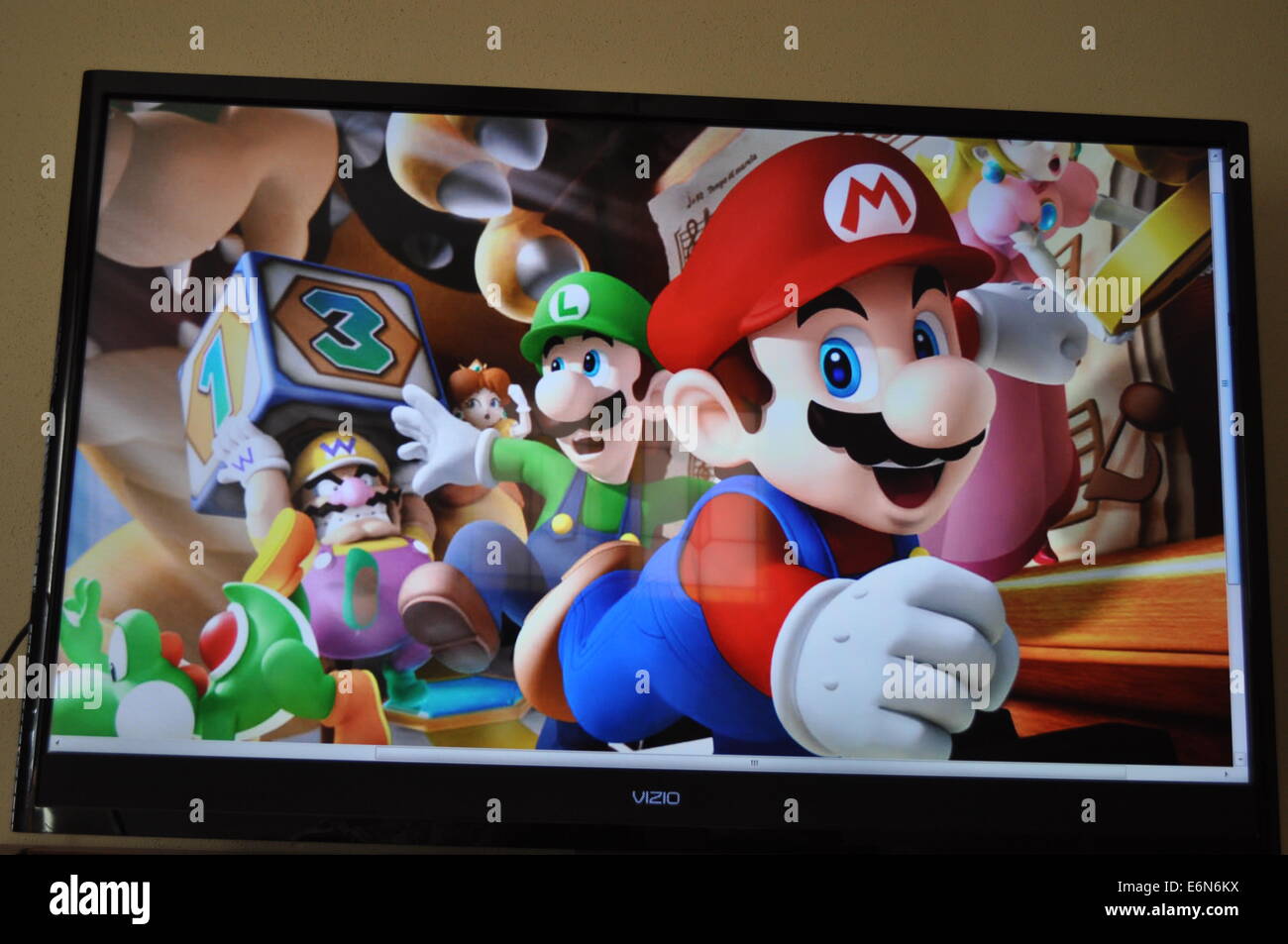 Photograph of a large, high definition, led tv displaying an image of a ...