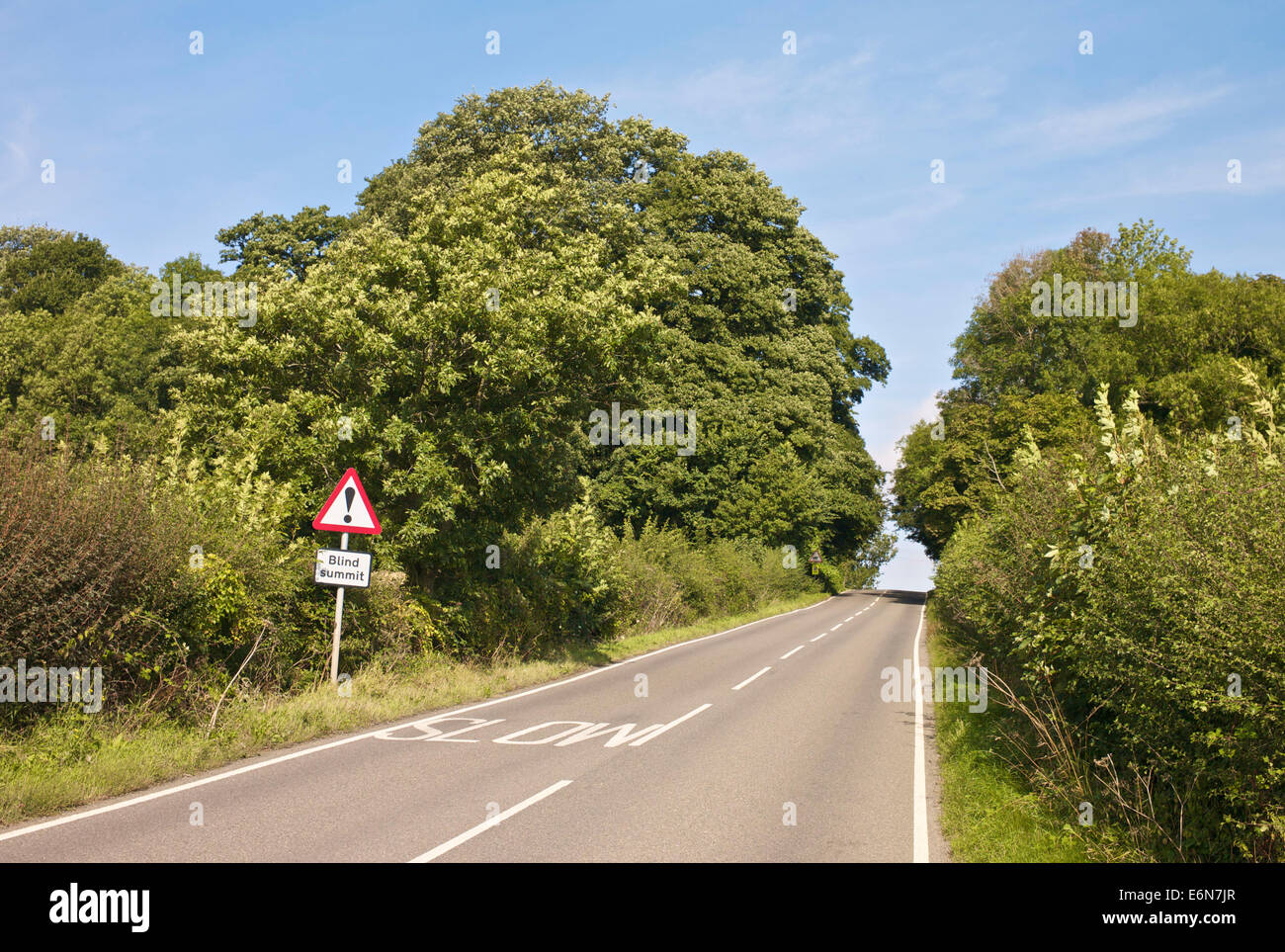 Uphill road sign hi-res stock photography and images - Alamy