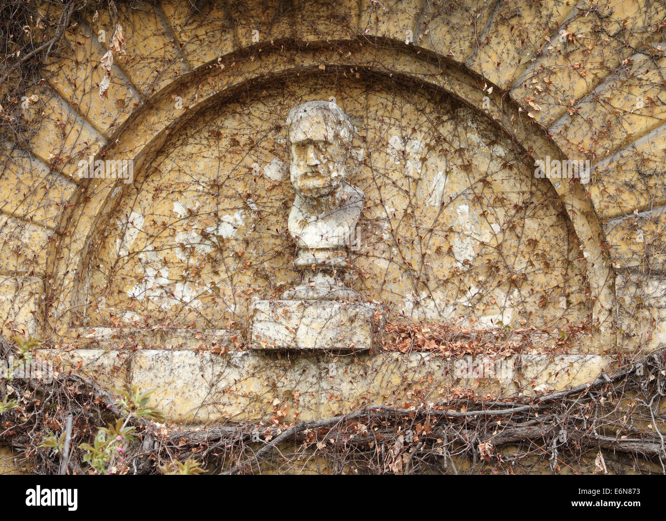 Eroded stone sculpture memorial grave at the cemetery Stock Photo - Alamy