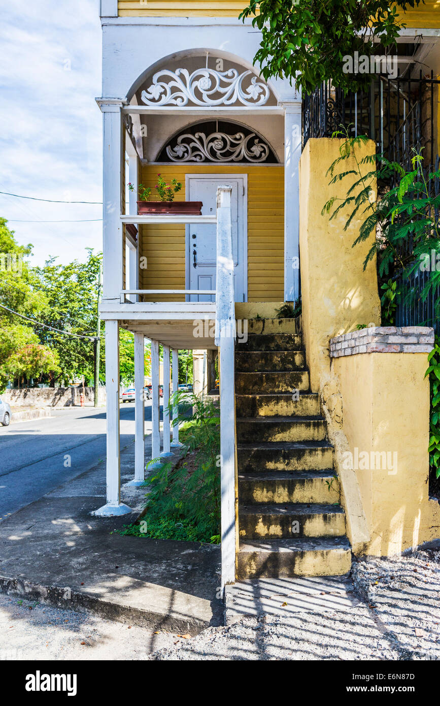 A stairway leads to a portico on an architecturally interesting old ...