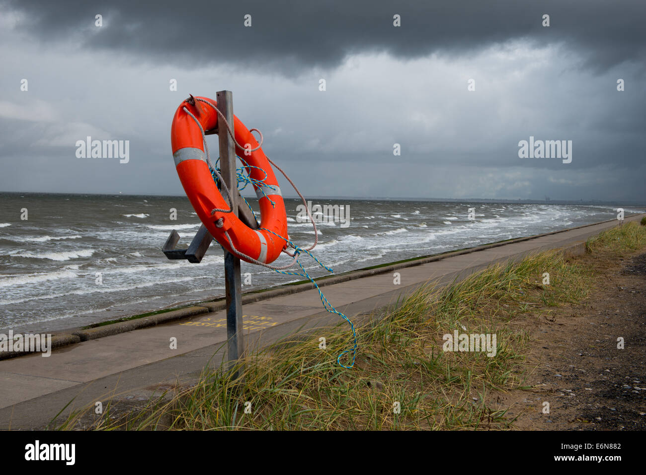 Life saver ..... a life belt guards rough seas Stock Photo - Alamy