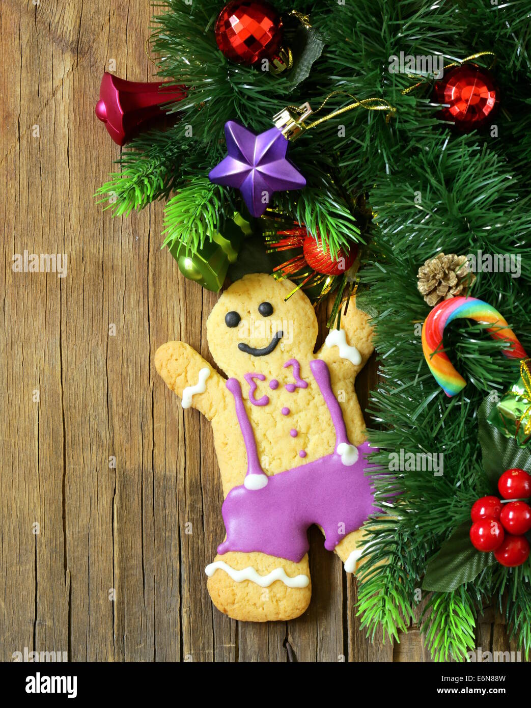 traditional Christmas gingerbread man with festive decorations and ...