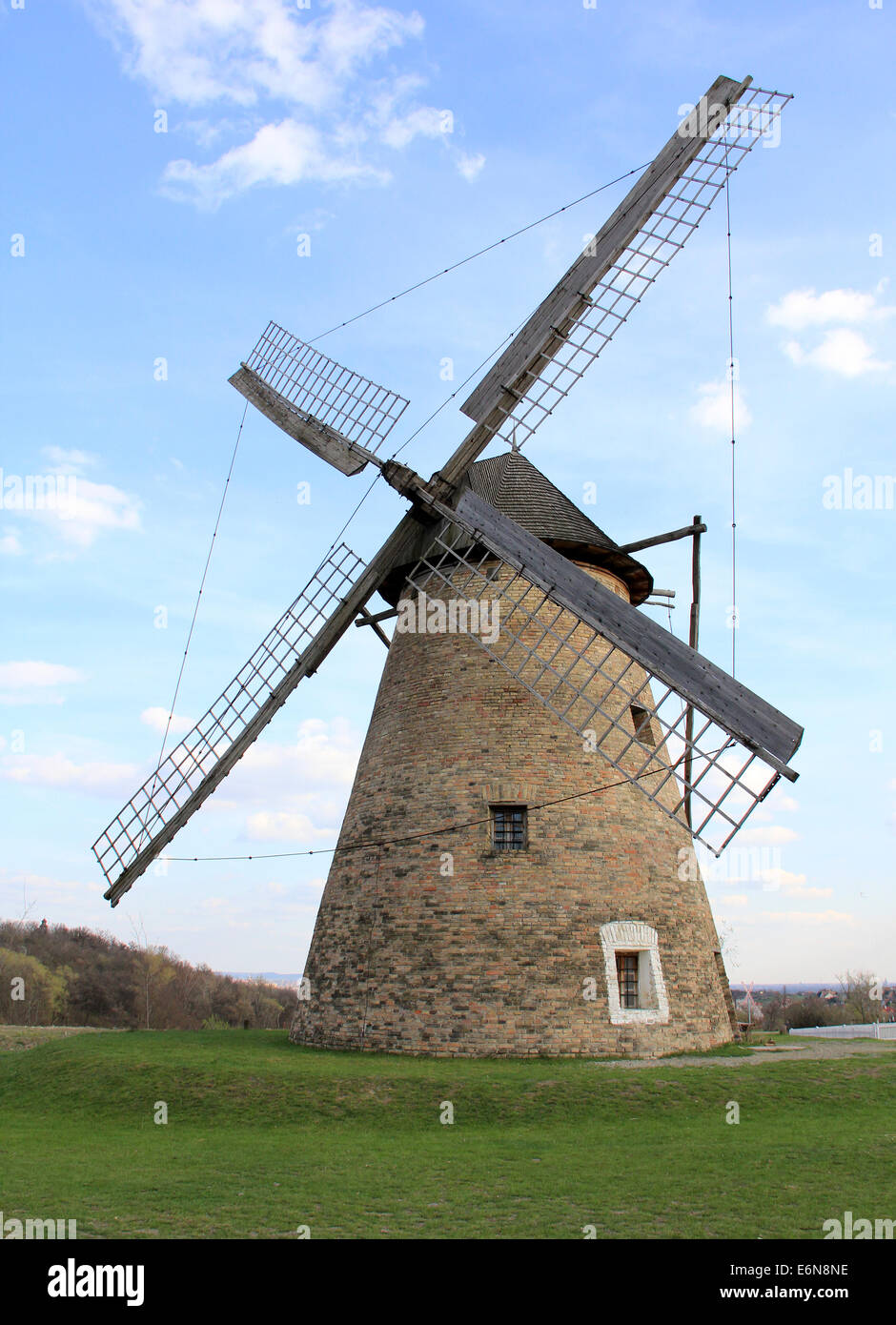 Separate ancient old windmill at rural landscape Stock Photo - Alamy