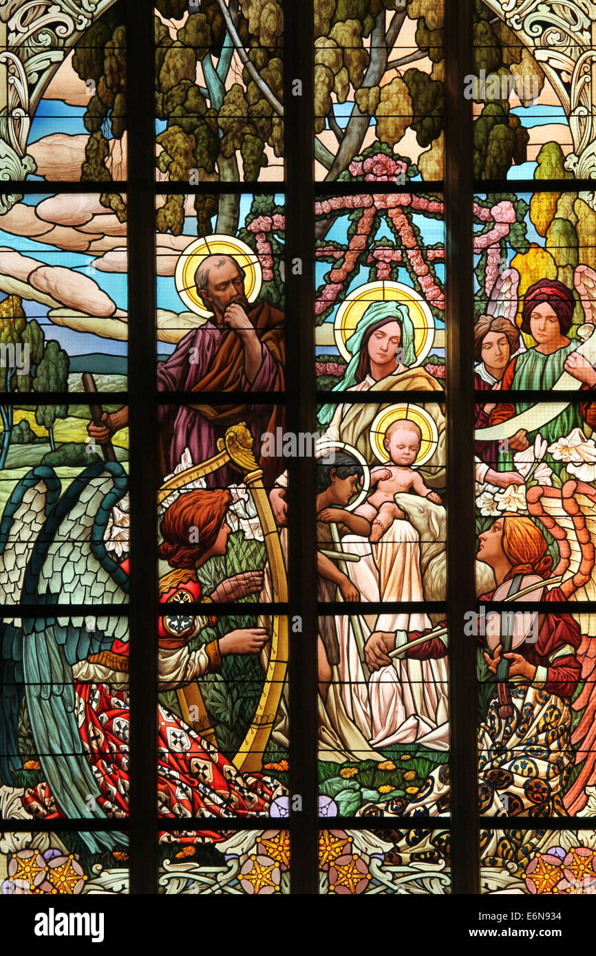 The Holy Family. Stained glass window in Saint Barbara's Church in ...