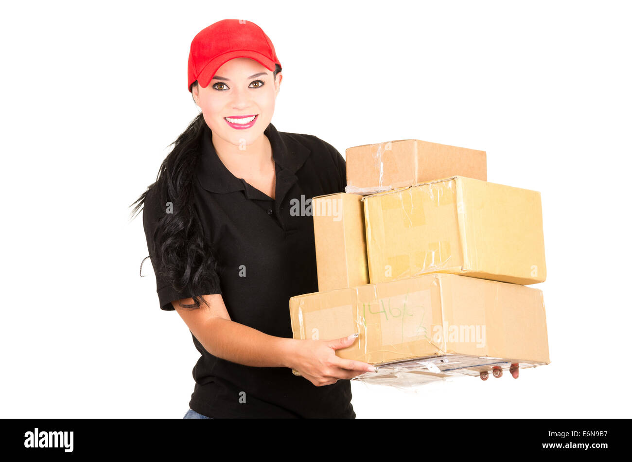 Beautiful smiling delivery girl holding packages Stock Photo - Alamy